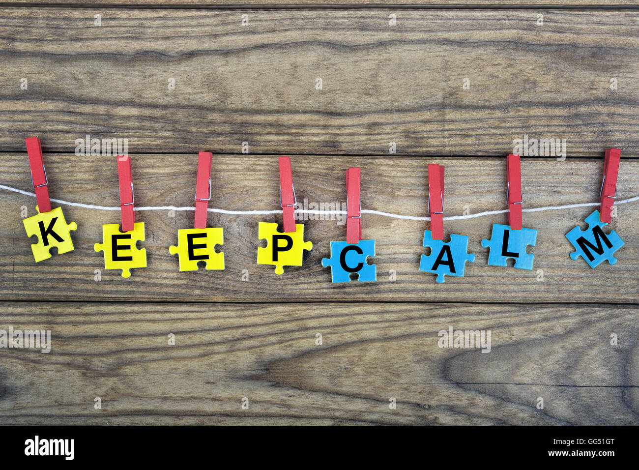 Puzzle pieces with word Keep calm Stock Photo - Alamy