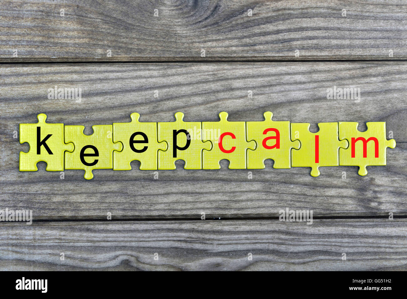 Puzzle pieces with word Keep calm Stock Photo - Alamy