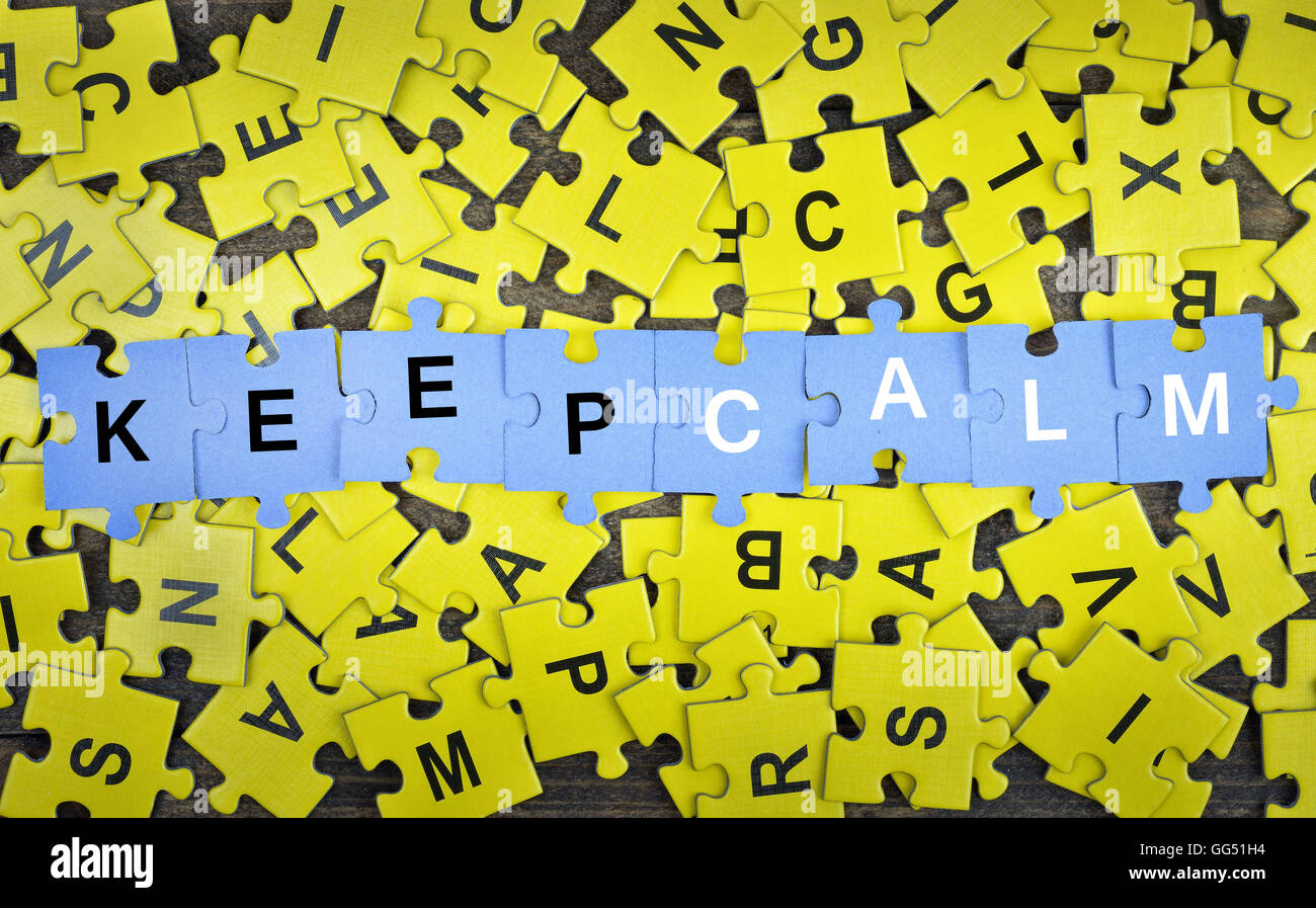 Puzzle pieces with word Keep calm Stock Photo - Alamy