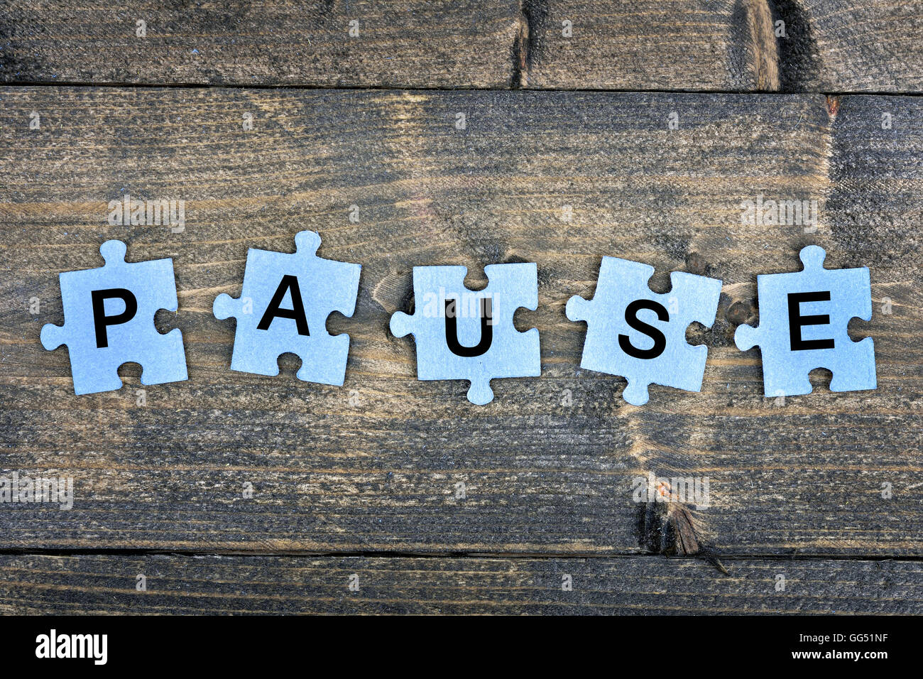 Puzzle pieces with word Pause Stock Photo - Alamy