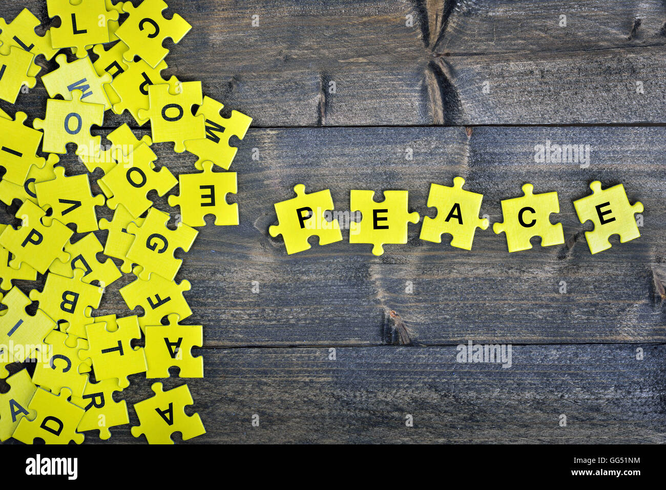 Puzzle pieces with word Peace Stock Photo - Alamy