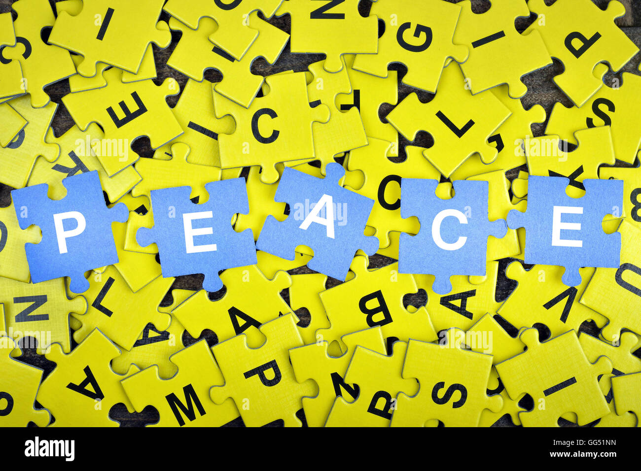 Puzzle pieces with word Peace Stock Photo - Alamy