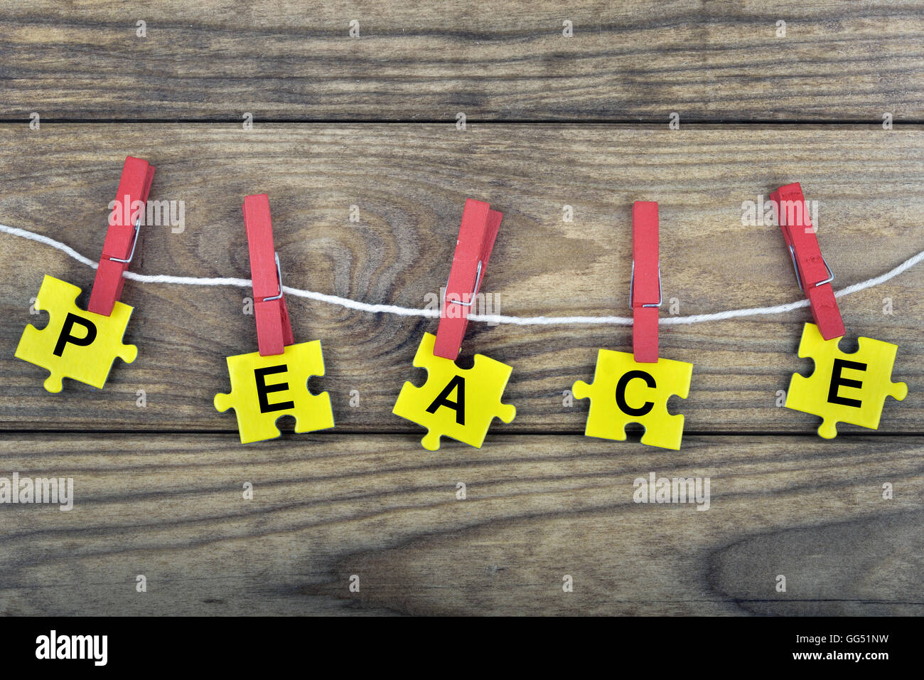 Puzzle pieces with word Peace Stock Photo - Alamy