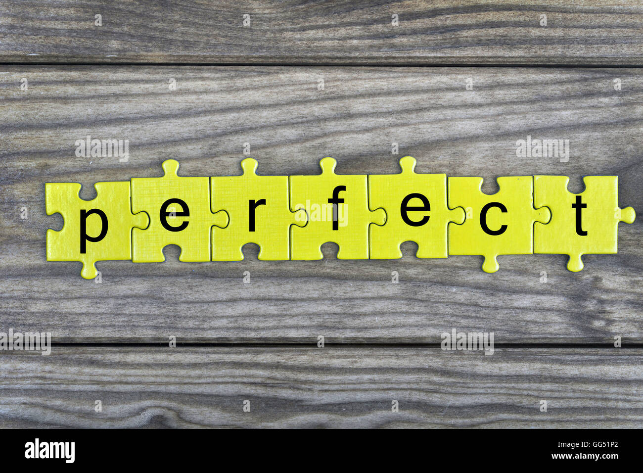Puzzle pieces with word Perfect Stock Photo - Alamy
