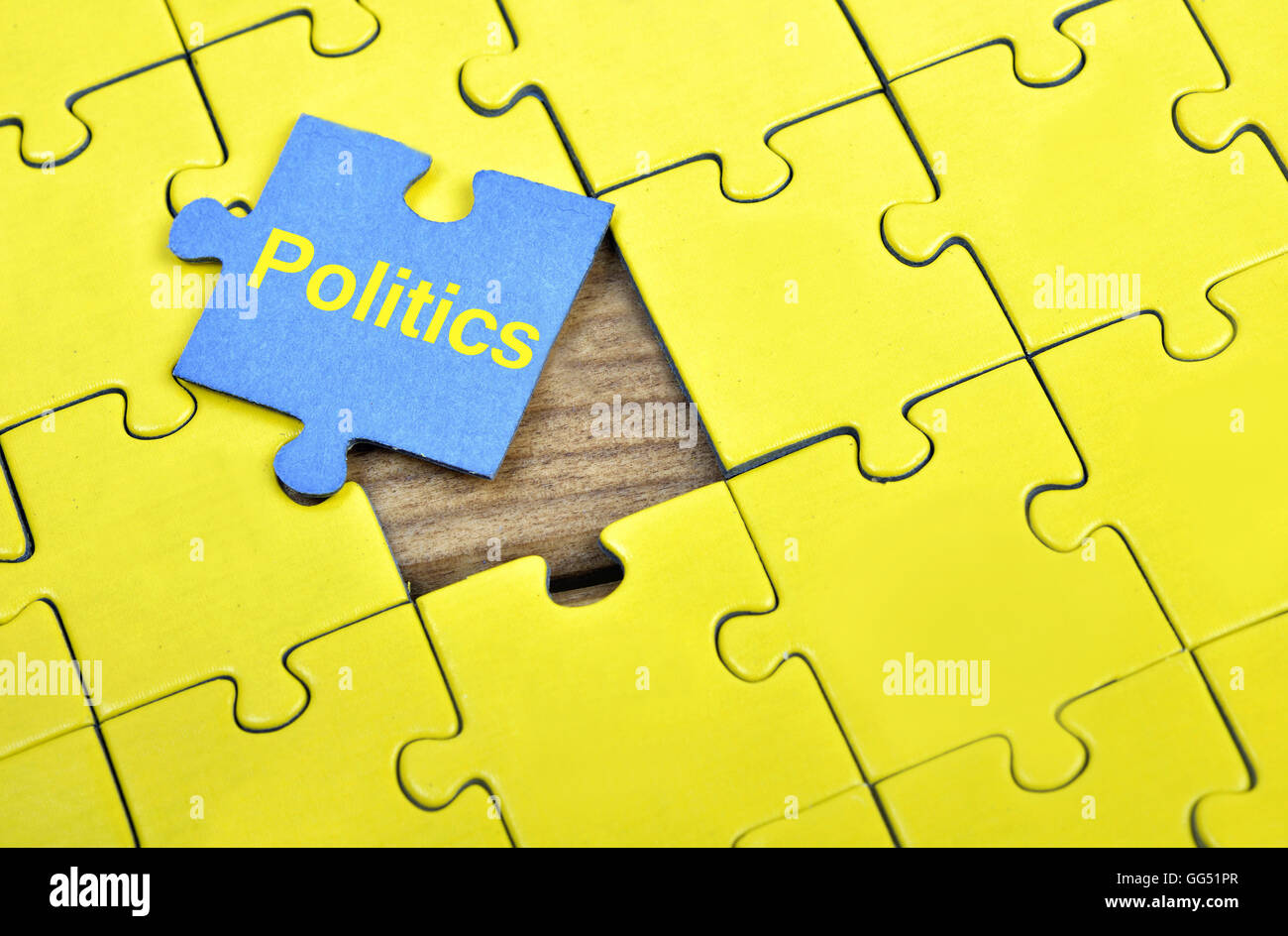 Puzzle pieces with word Politics Stock Photo - Alamy