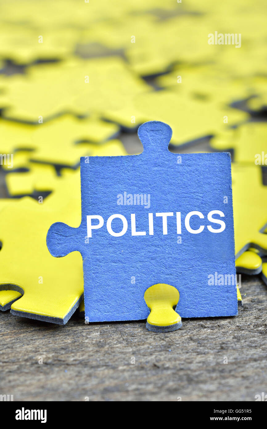 Puzzle pieces with word Politics Stock Photo - Alamy