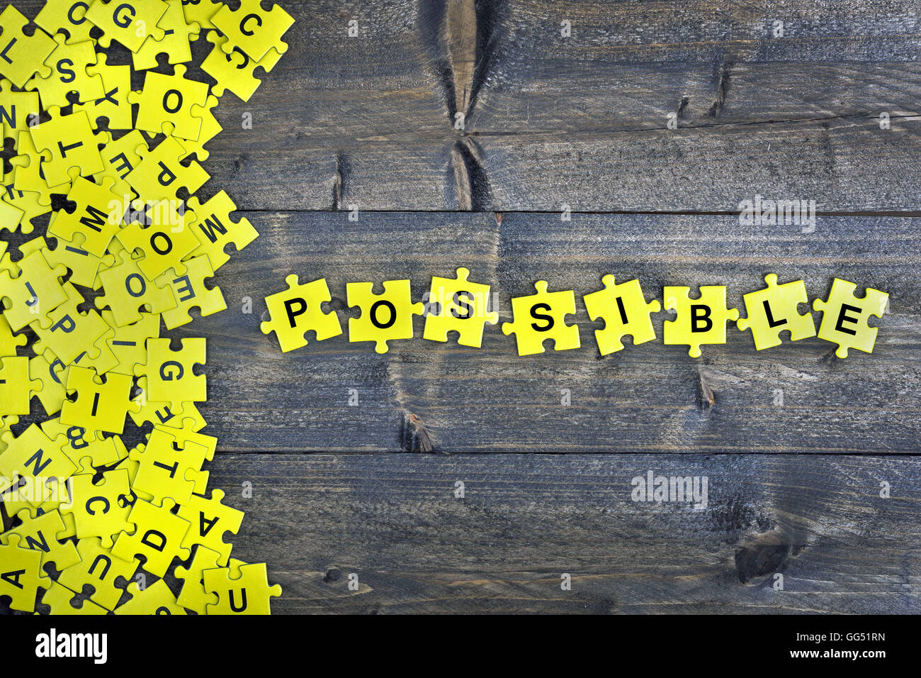 Puzzle pieces with word Possible Stock Photo - Alamy
