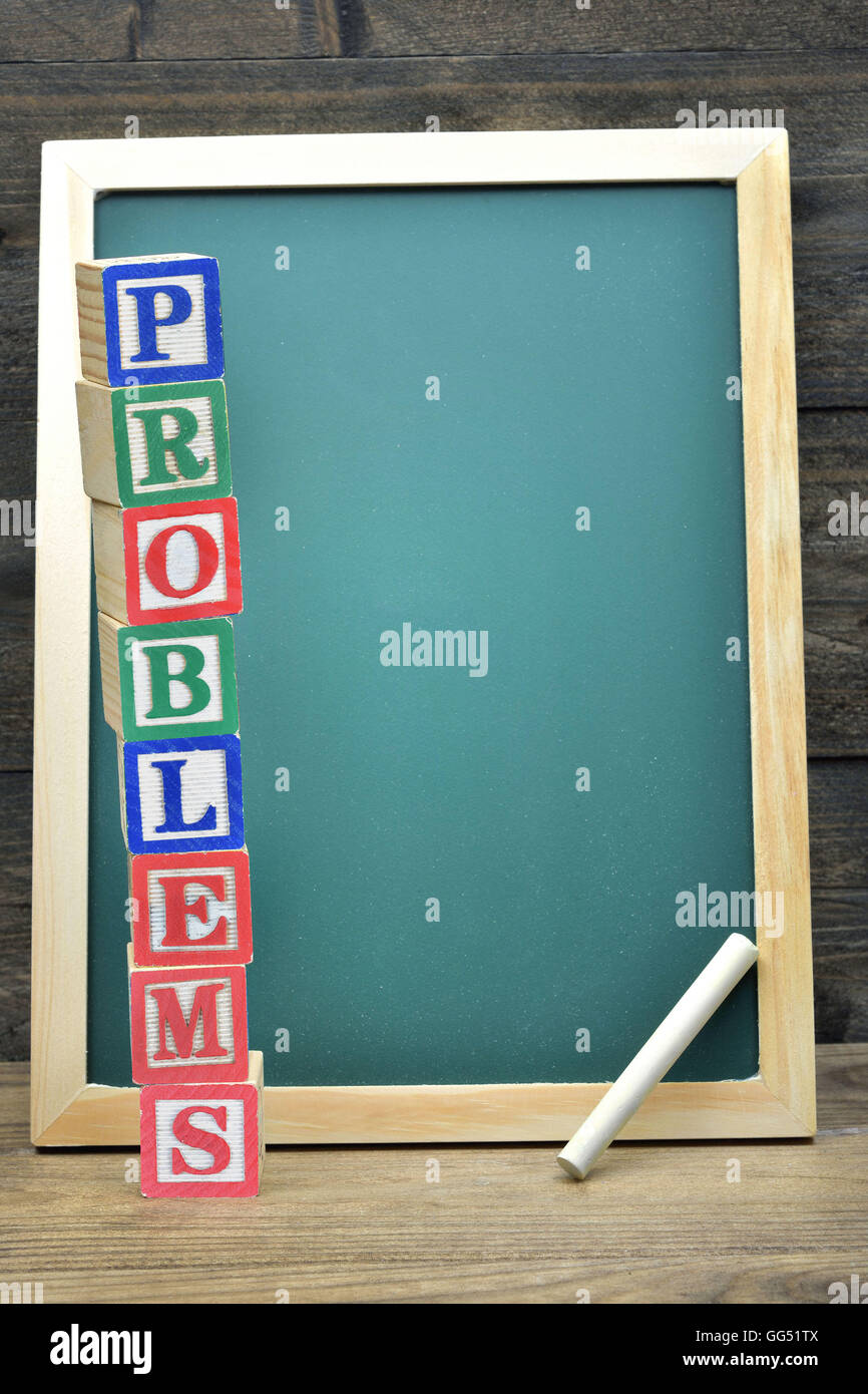 School board and word Problems on wooden table Stock Photo - Alamy