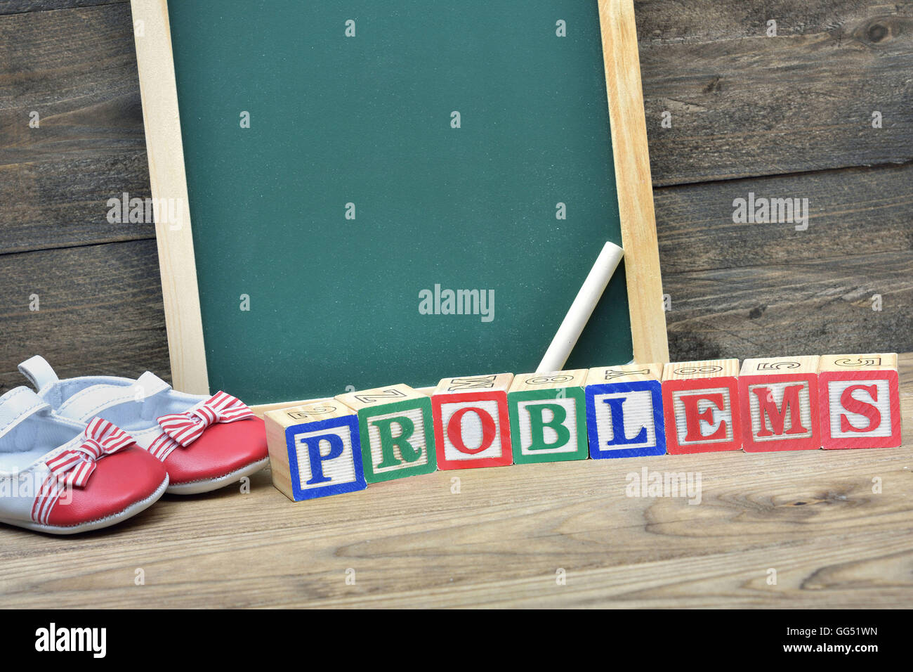 School board and word Problems on wooden table Stock Photo - Alamy
