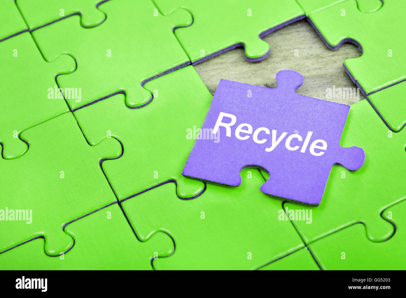 Puzzle pieces with word Recycle Stock Photo - Alamy