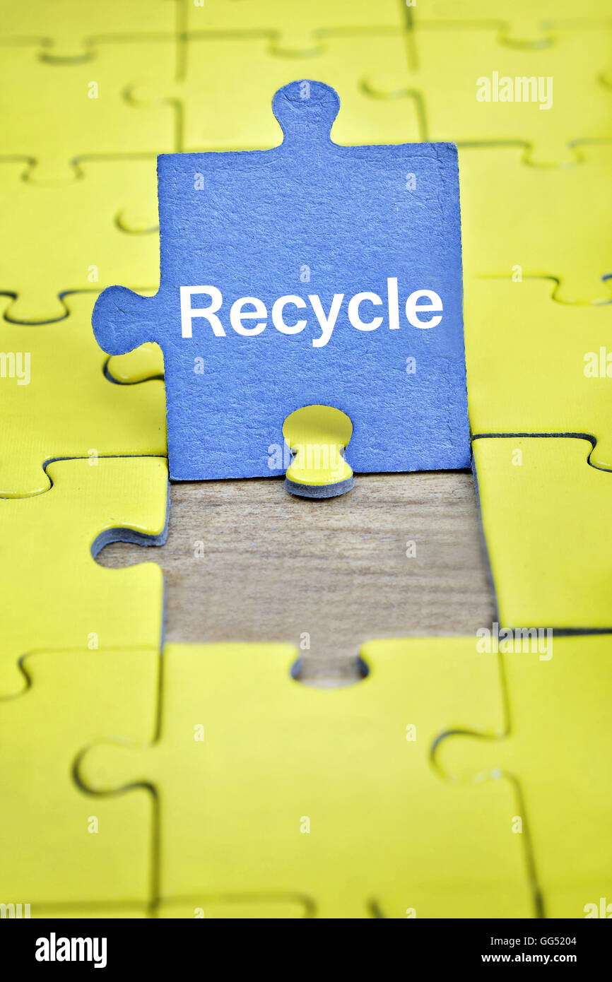 Puzzle pieces with word Recycle Stock Photo - Alamy