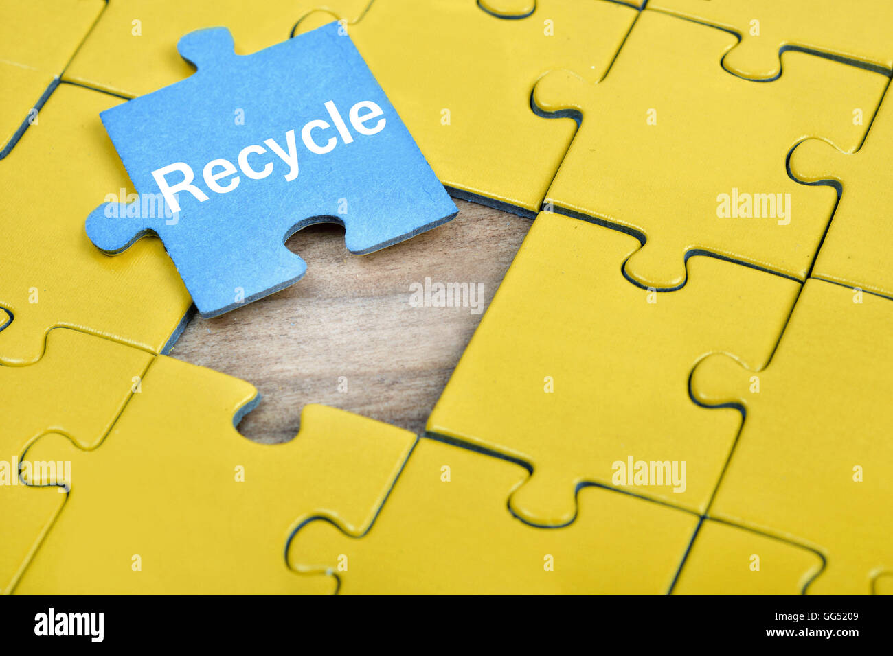Puzzle pieces with word Recycle Stock Photo - Alamy