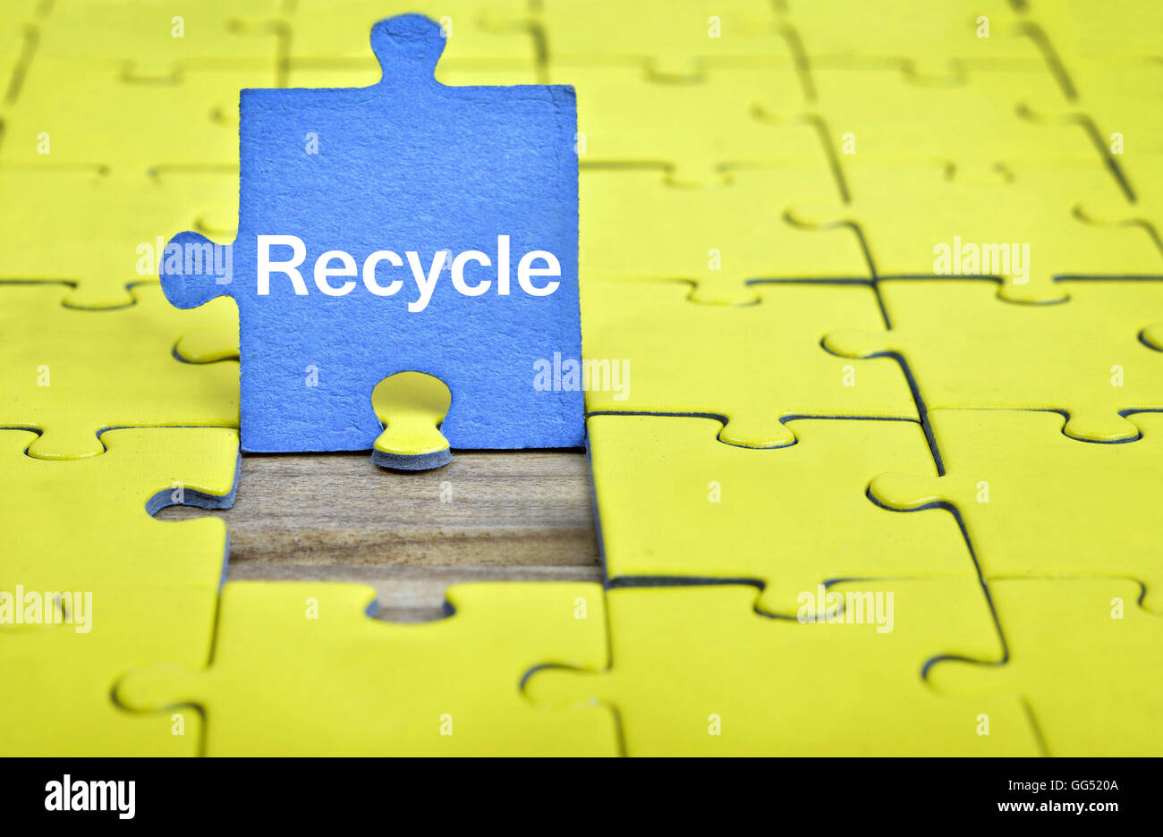Puzzle pieces with word Recycle Stock Photo - Alamy