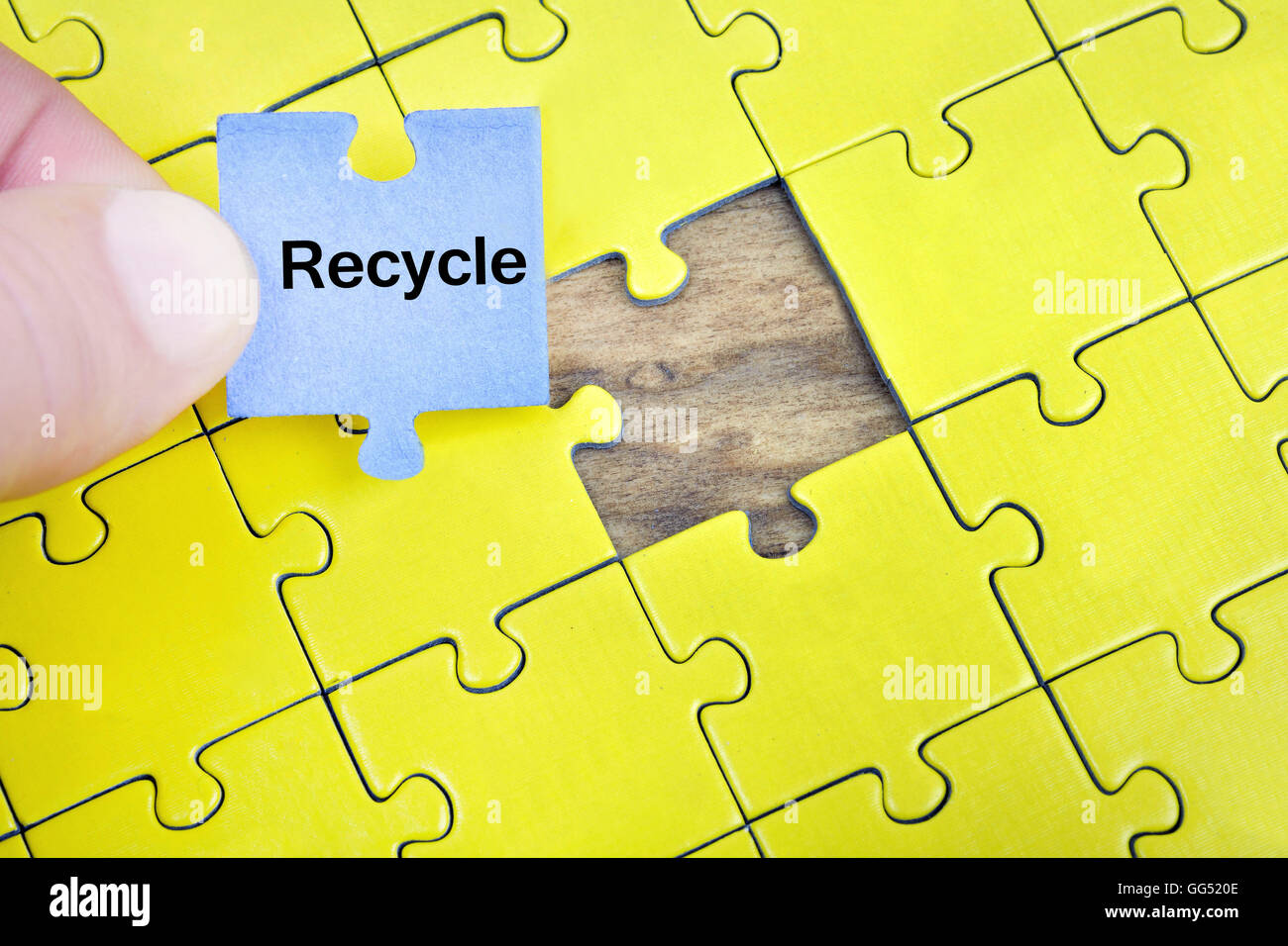 Puzzle pieces with word Recycle Stock Photo - Alamy