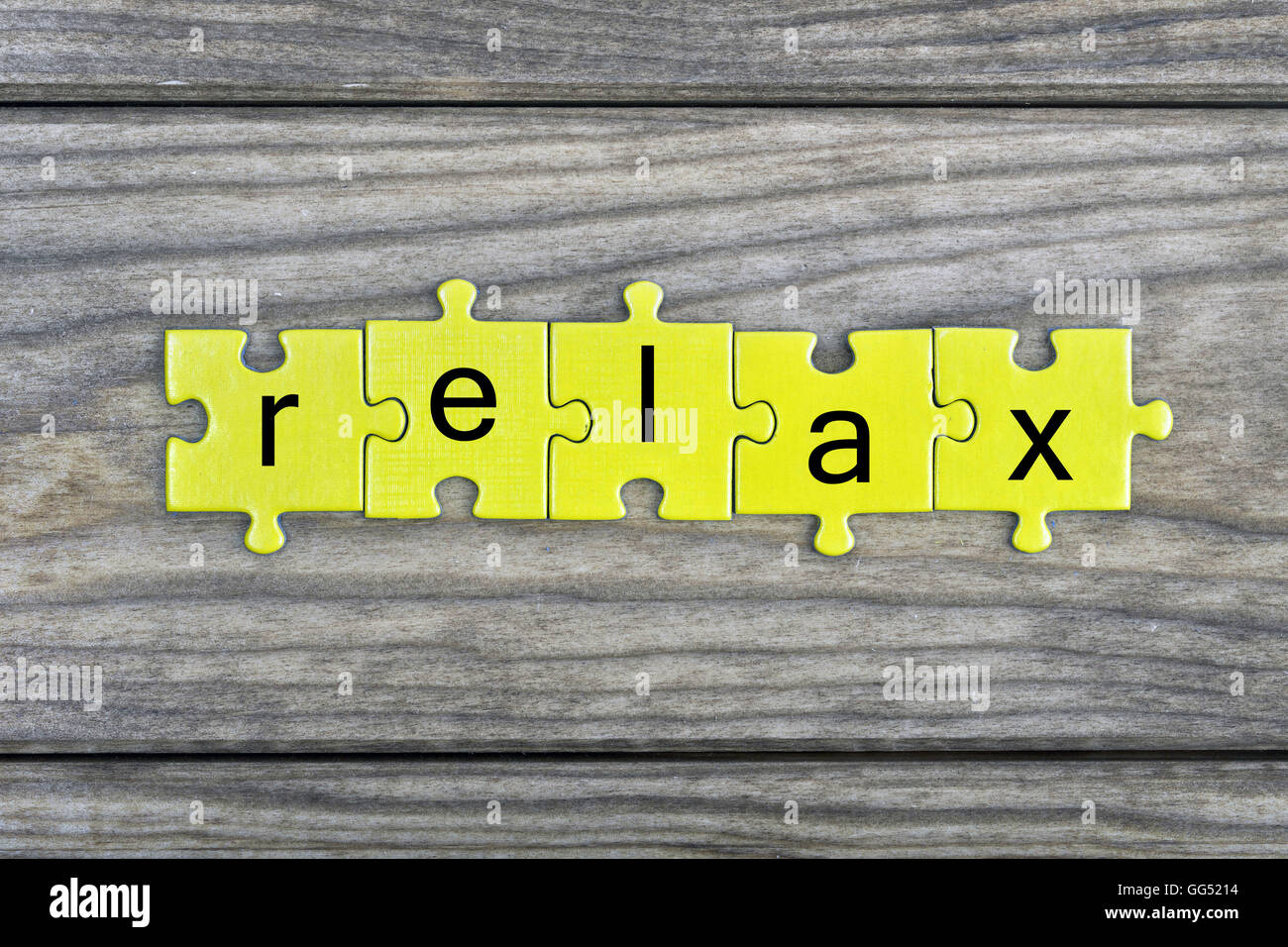 Puzzle pieces with word Relax Stock Photo - Alamy