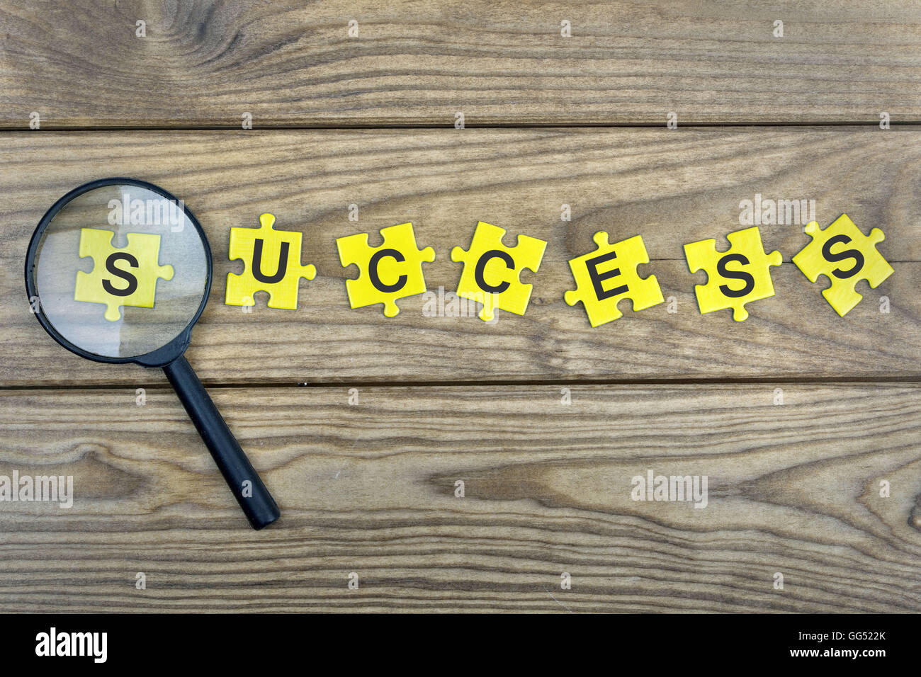 Puzzle pieces with word Success Stock Photo - Alamy