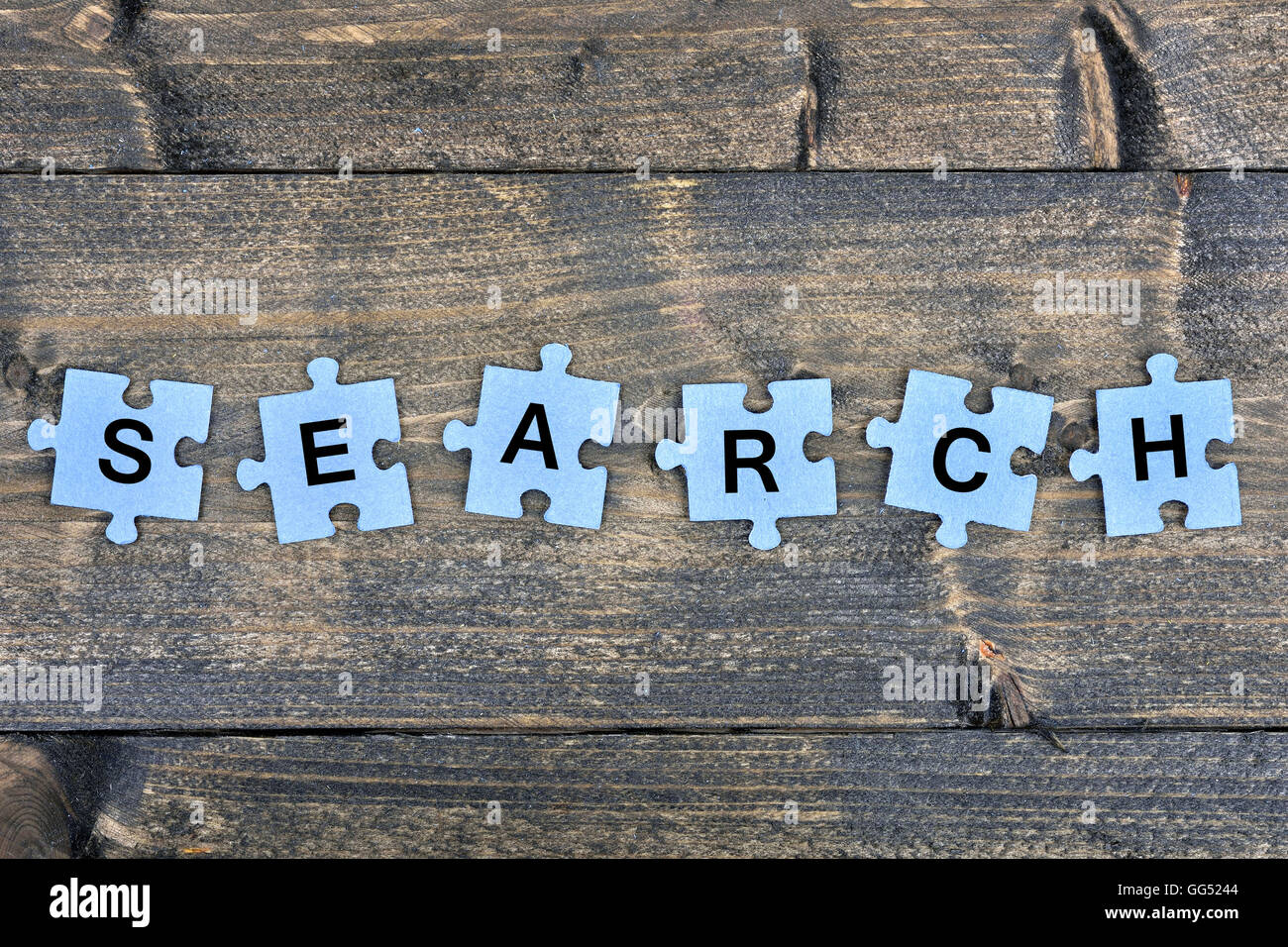 Puzzle pieces with word Search Stock Photo - Alamy