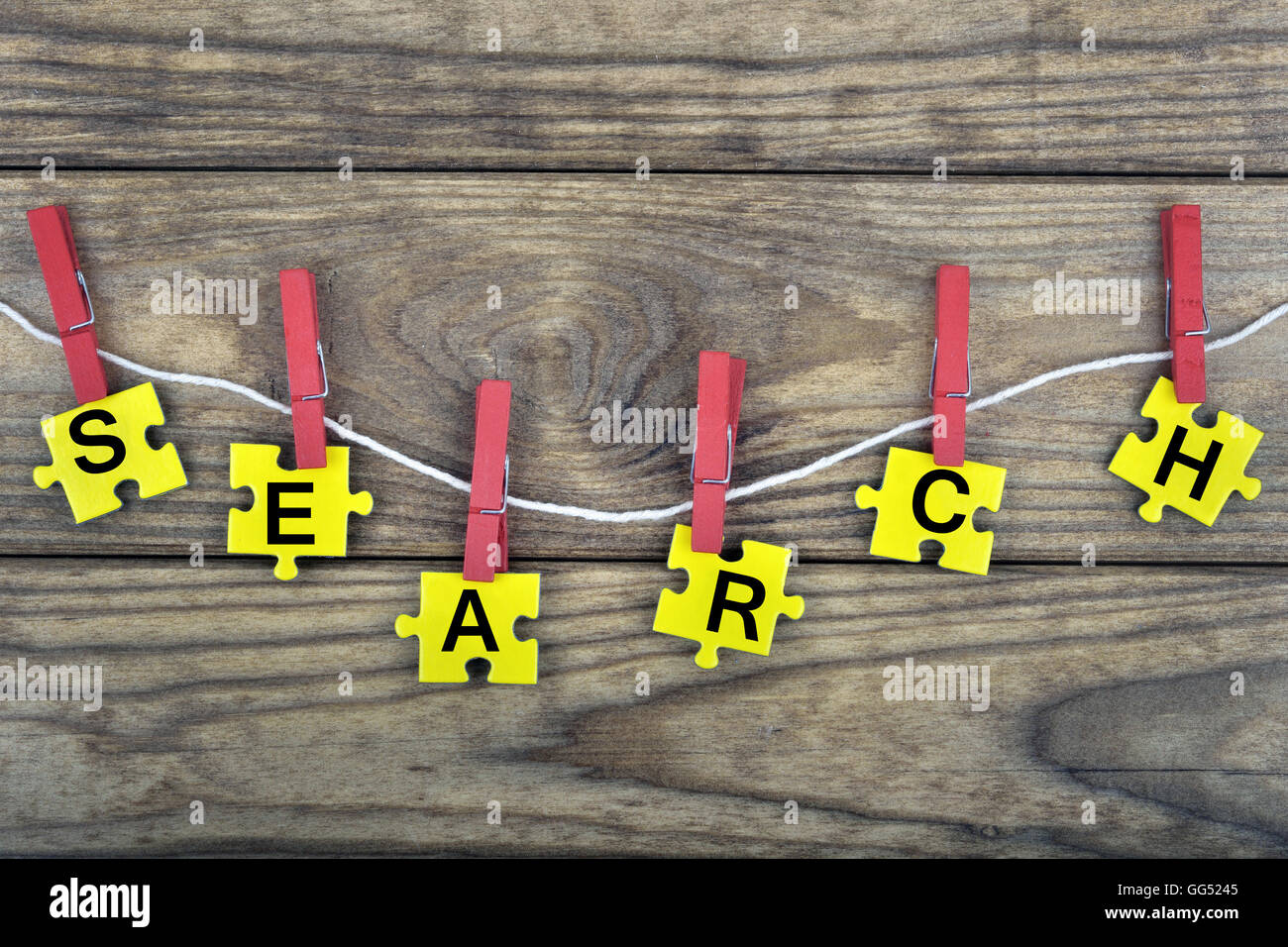 Puzzle pieces with word Search Stock Photo - Alamy