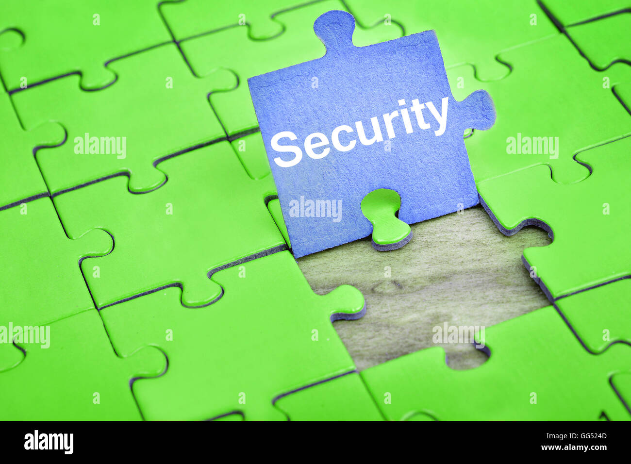 Puzzle pieces with word Security Stock Photo - Alamy