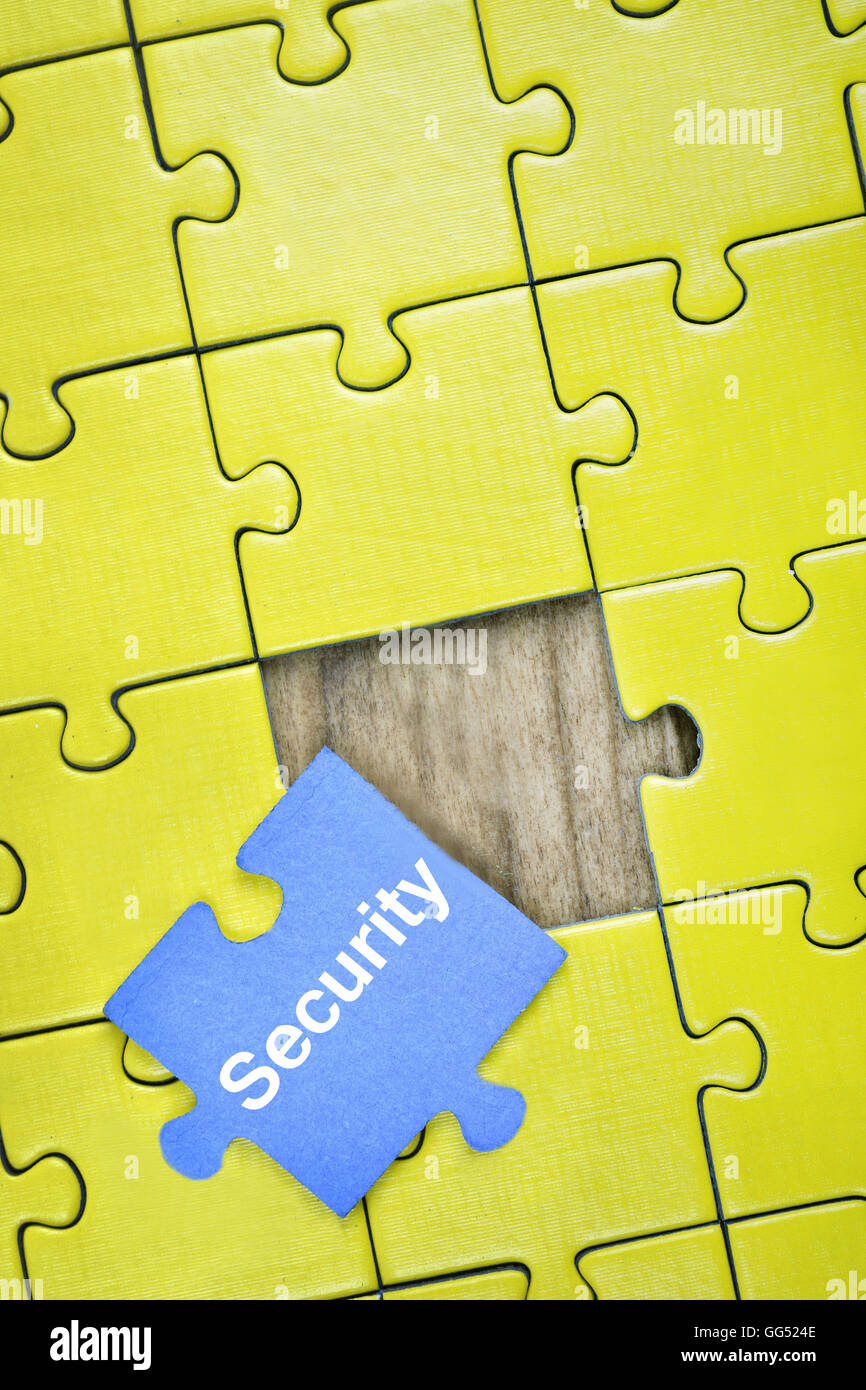 Puzzle pieces with word Security Stock Photo - Alamy