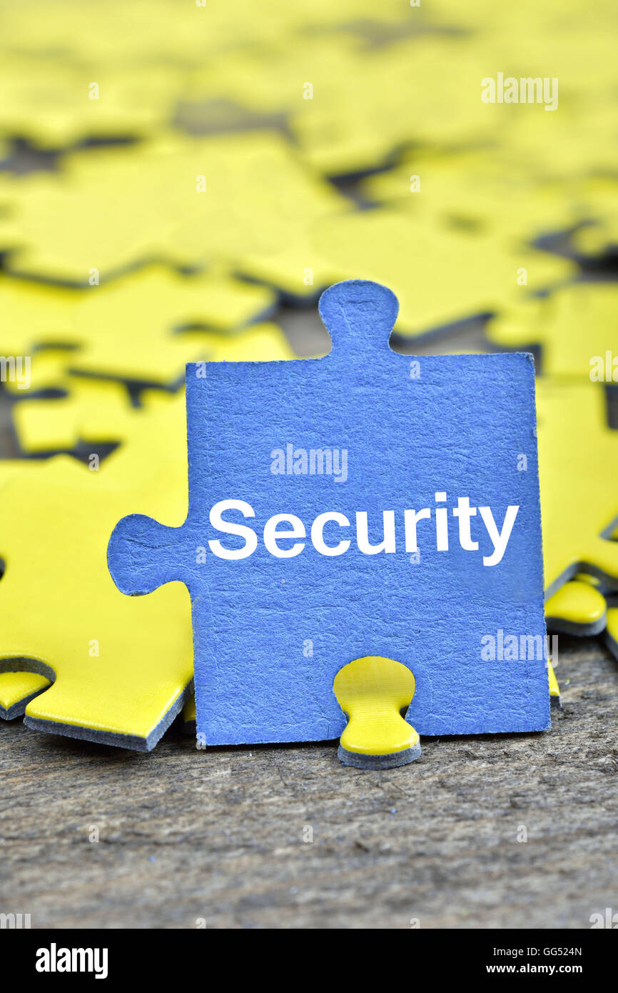 Puzzle pieces with word Security Stock Photo - Alamy