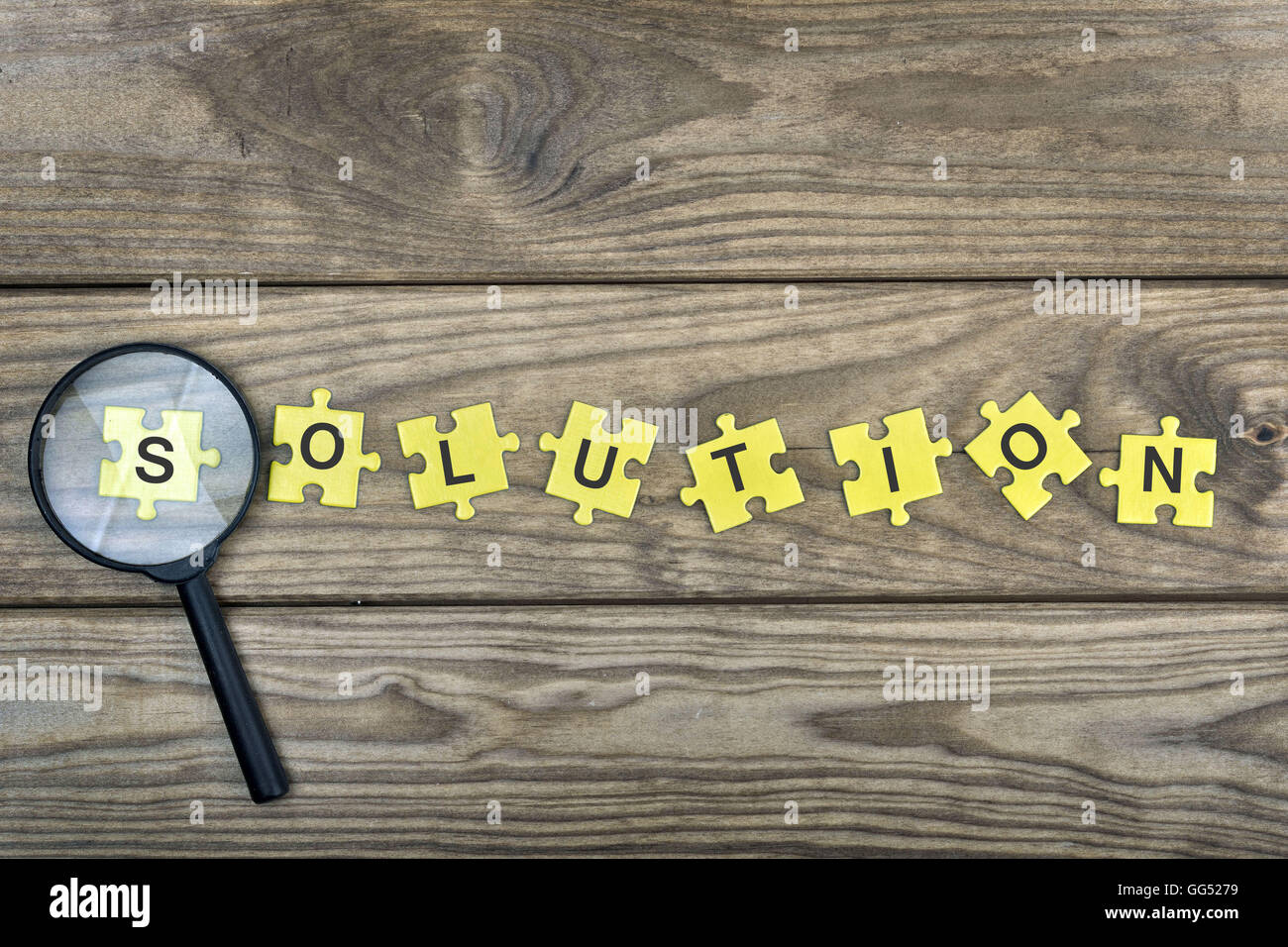 Puzzle pieces with word Solution Stock Photo - Alamy