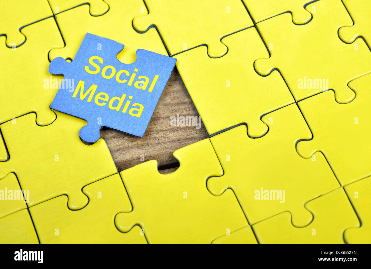 Puzzle pieces with word Social Media Stock Photo - Alamy