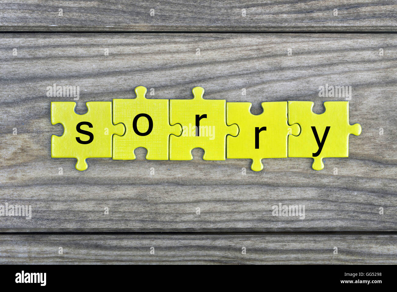 Puzzle pieces with word Sorry Stock Photo - Alamy