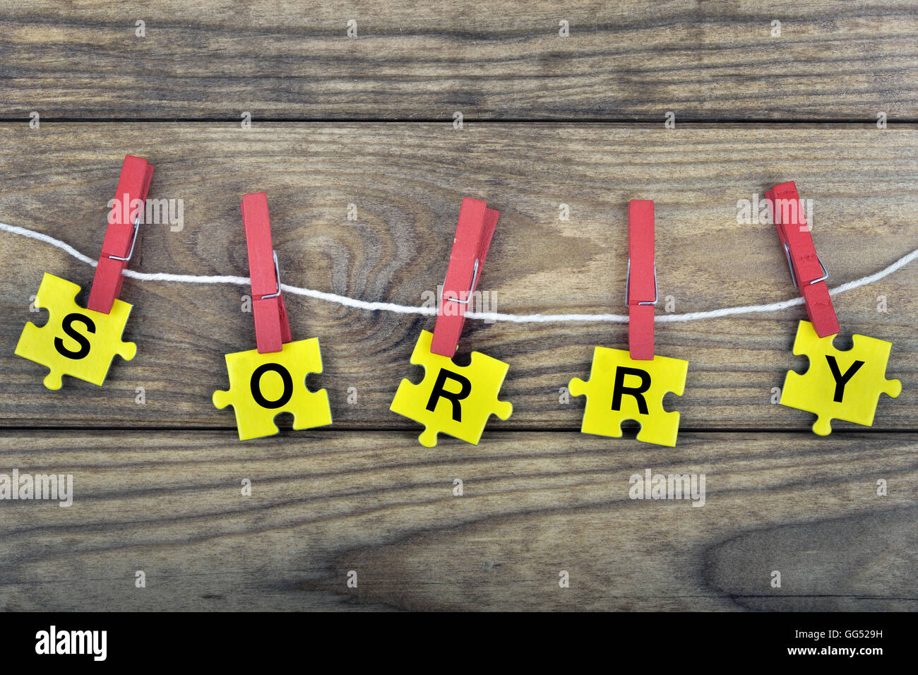 Puzzle pieces with word Sorry Stock Photo - Alamy