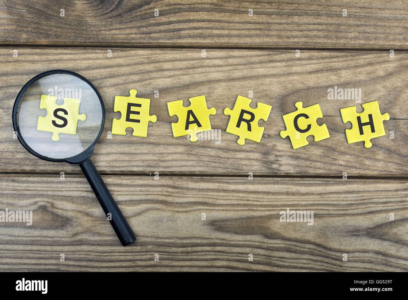 Puzzle pieces with word Search Stock Photo - Alamy