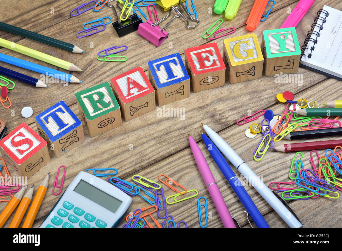 Strategy word and office tools Stock Photo - Alamy