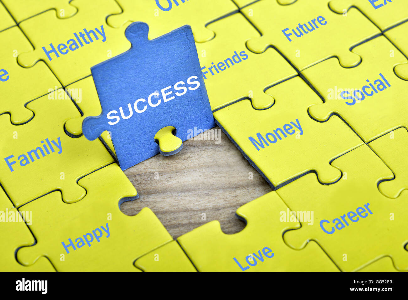 Puzzle pieces with word Success Stock Photo - Alamy