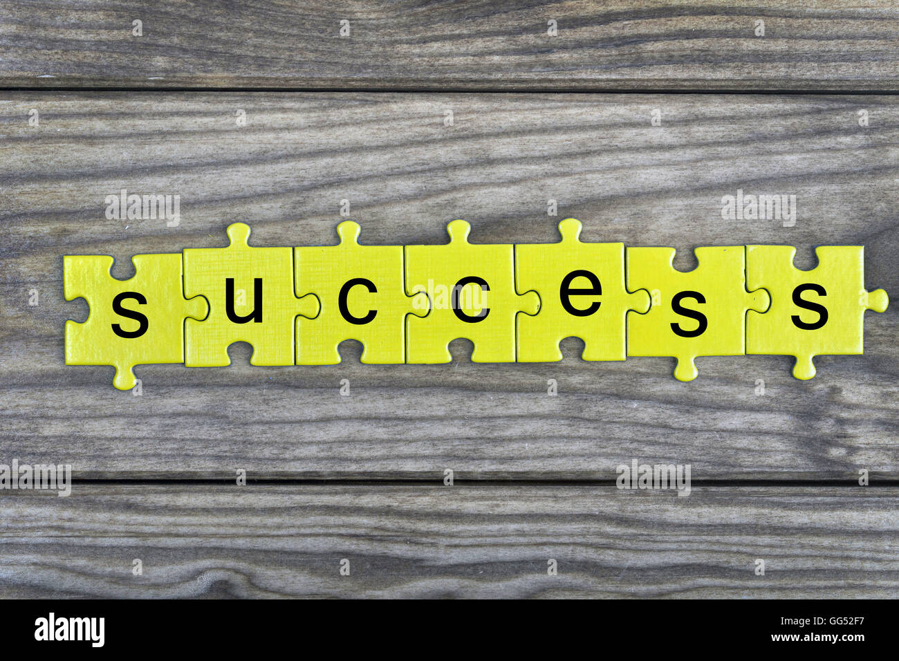 Puzzle pieces with word Success Stock Photo - Alamy