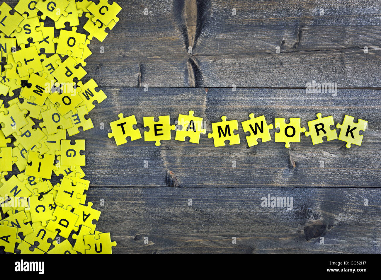 Puzzle pieces with word Teamwork Stock Photo - Alamy