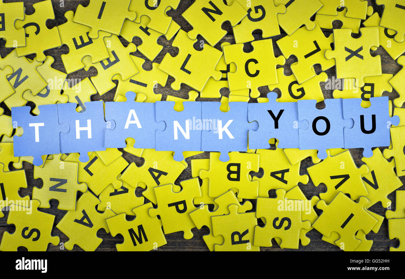Puzzle pieces with word Thank you Stock Photo - Alamy