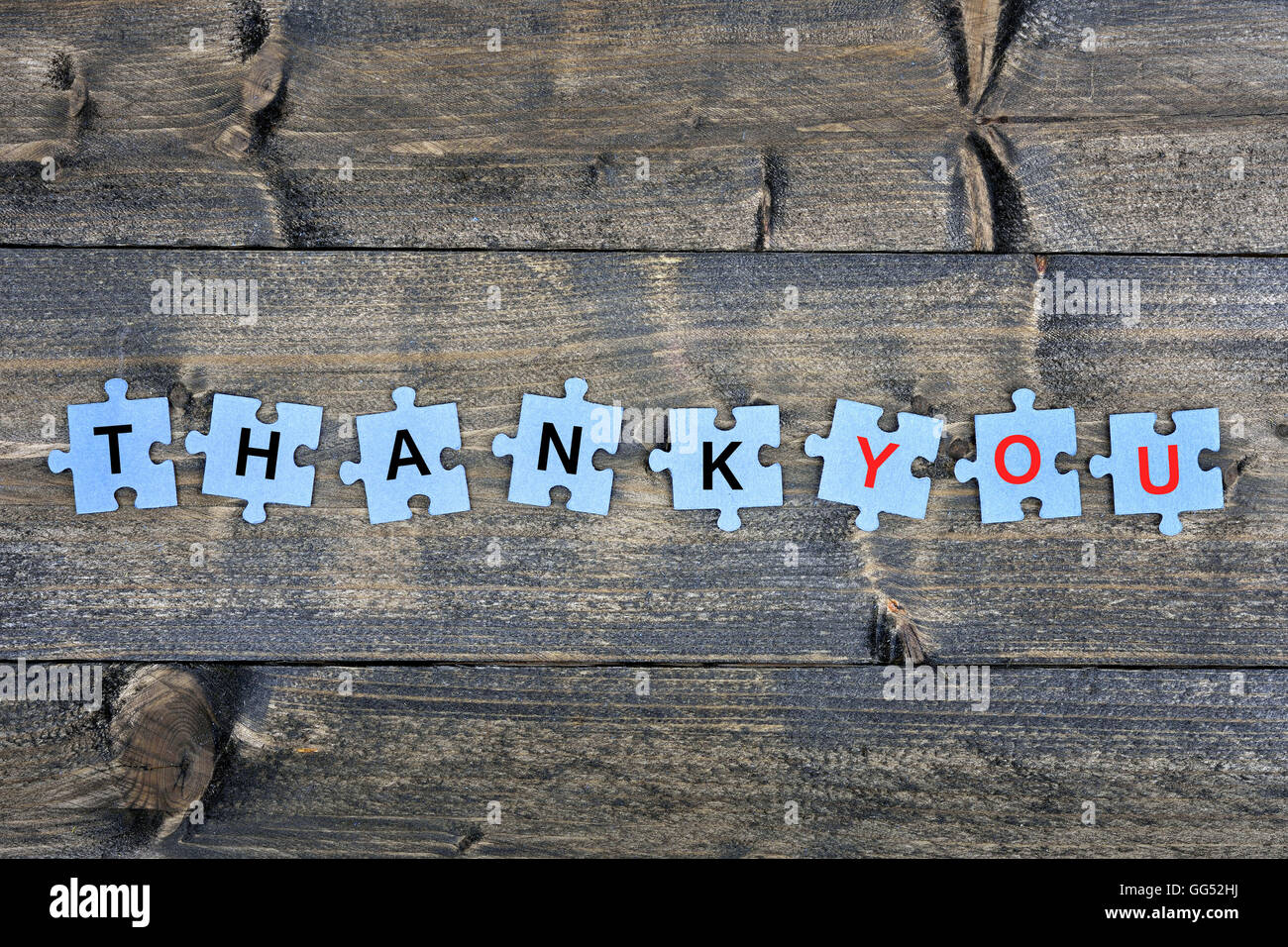 Puzzle pieces with word Thank you Stock Photo - Alamy