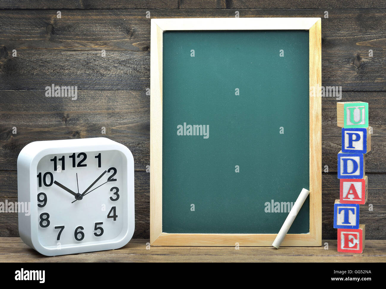 School board and word Update on wooden table Stock Photo - Alamy