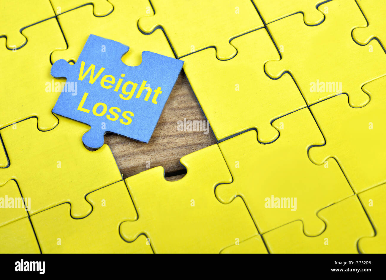 Puzzle pieces with word Weight Loss Stock Photo - Alamy