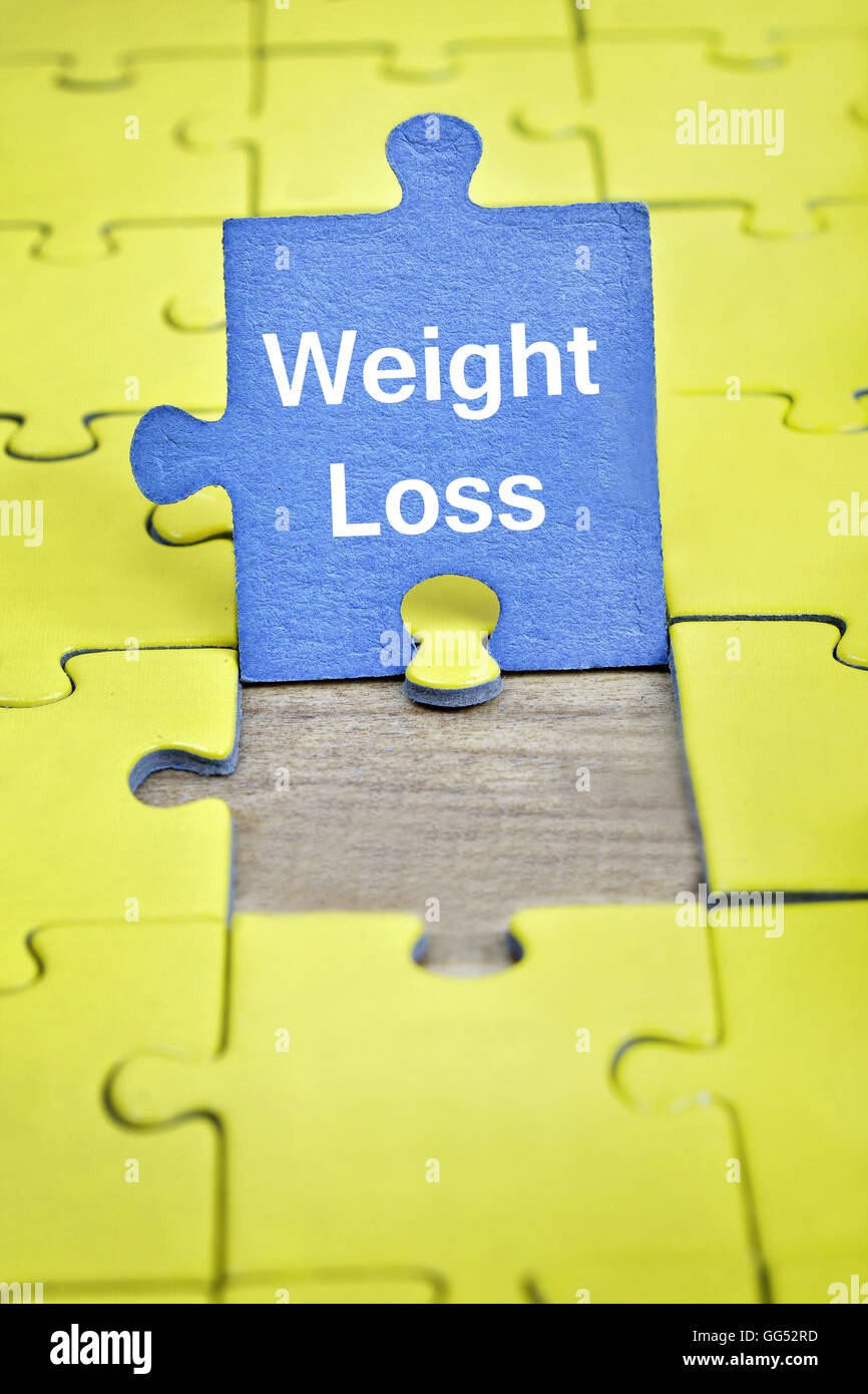 Puzzle pieces with word Weight Loss Stock Photo - Alamy