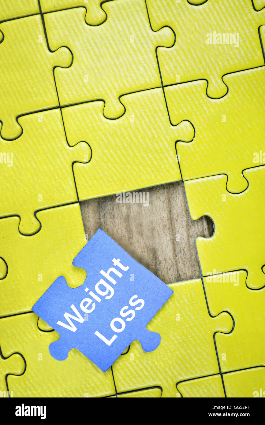 Puzzle pieces with word Weight Loss Stock Photo - Alamy