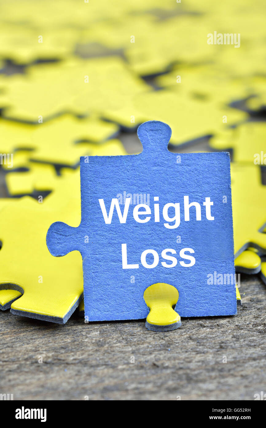 Puzzle pieces with word Weight Loss Stock Photo - Alamy