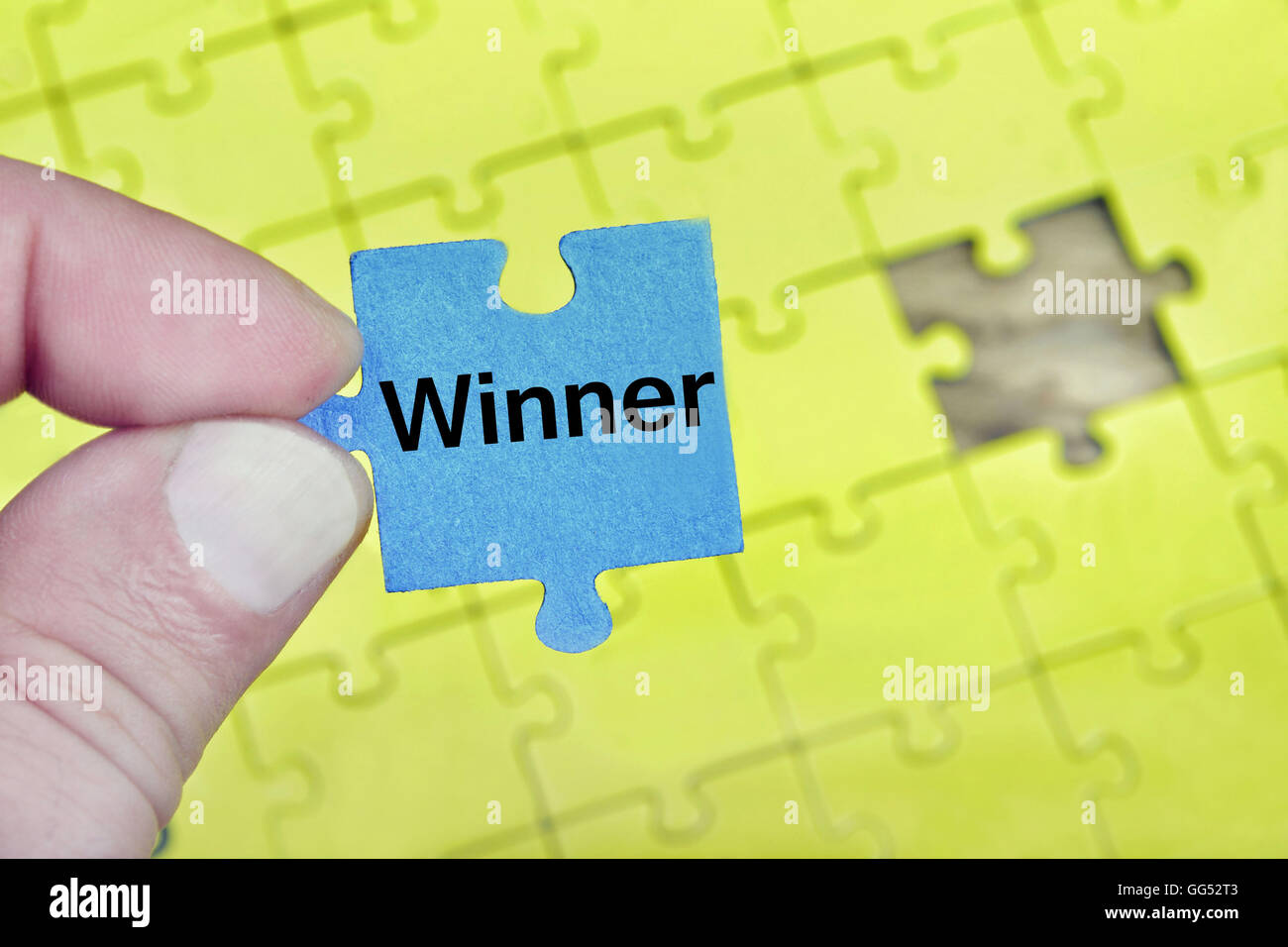 Puzzle pieces with word Winner Stock Photo - Alamy