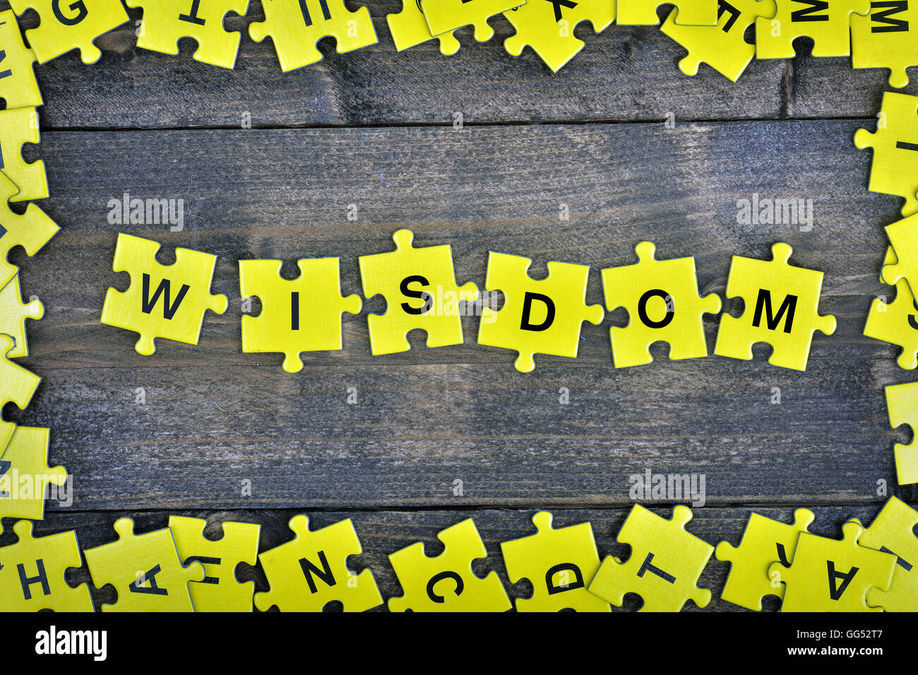 Puzzle pieces with word Wisdom Stock Photo - Alamy
