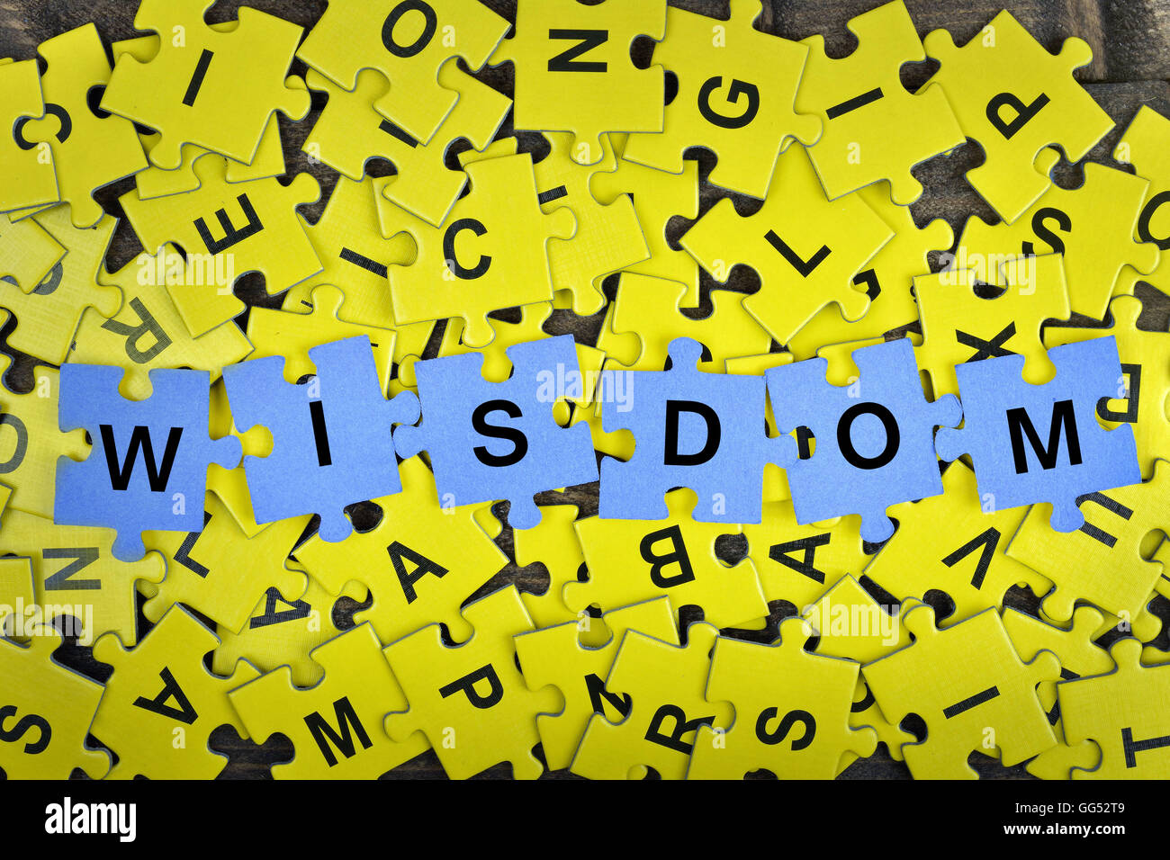 Puzzle pieces with word Wisdom Stock Photo - Alamy