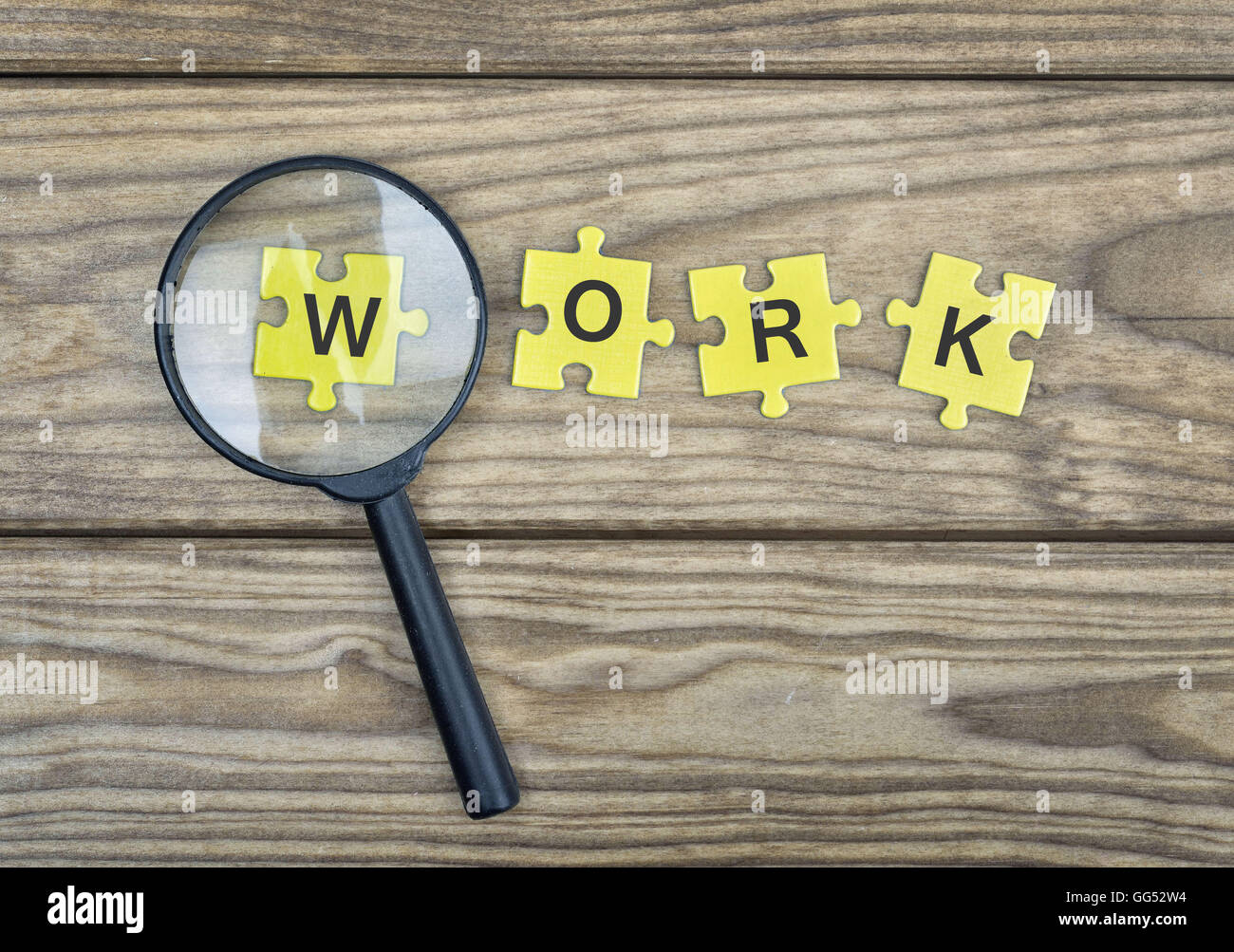 Puzzle pieces with word Work Stock Photo - Alamy