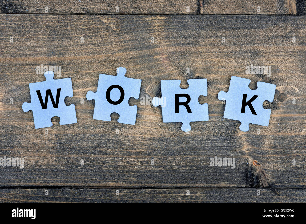 Puzzle pieces with word Stock Photo - Alamy