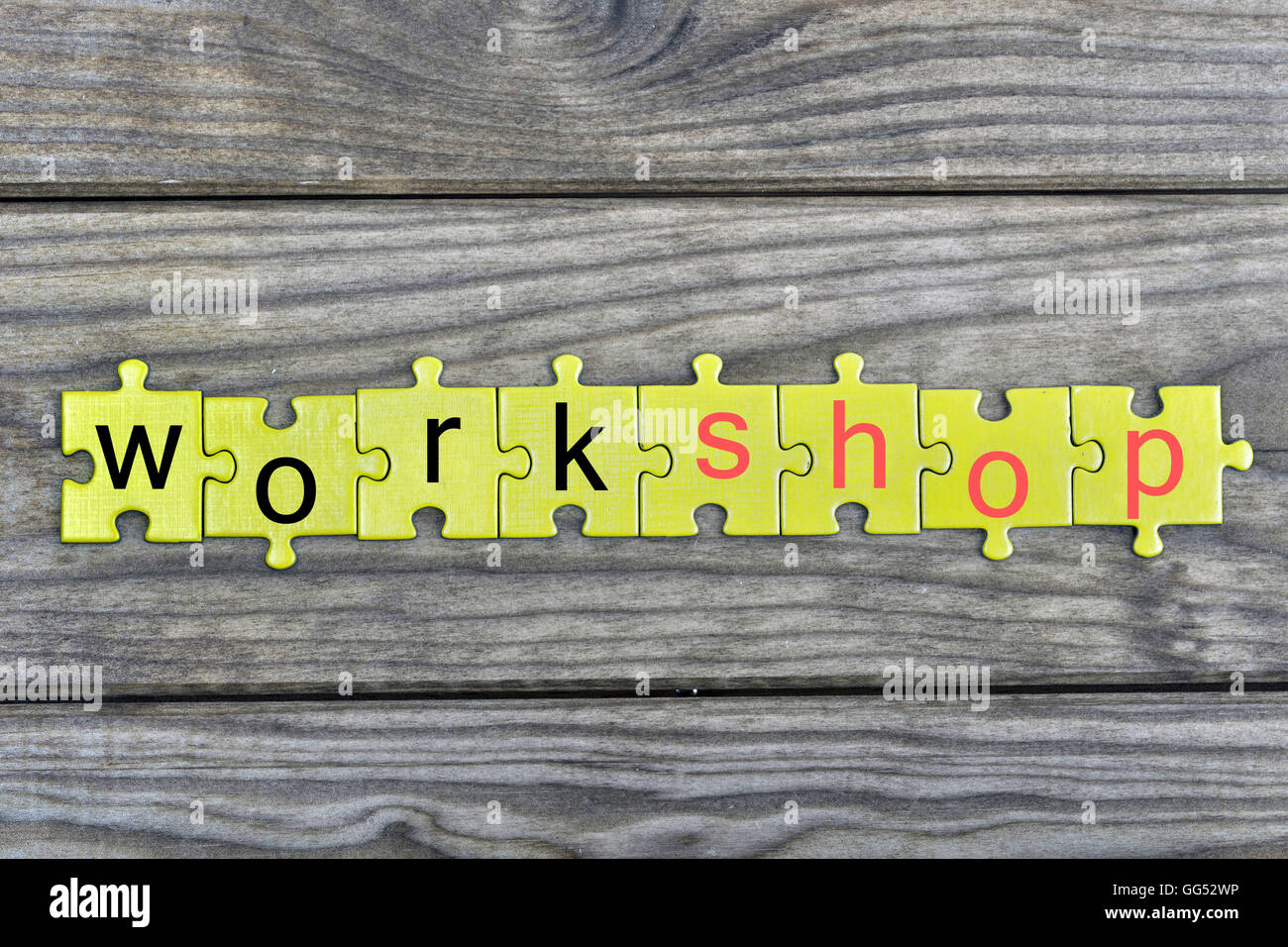 Puzzle pieces with word workshop Stock Photo - Alamy