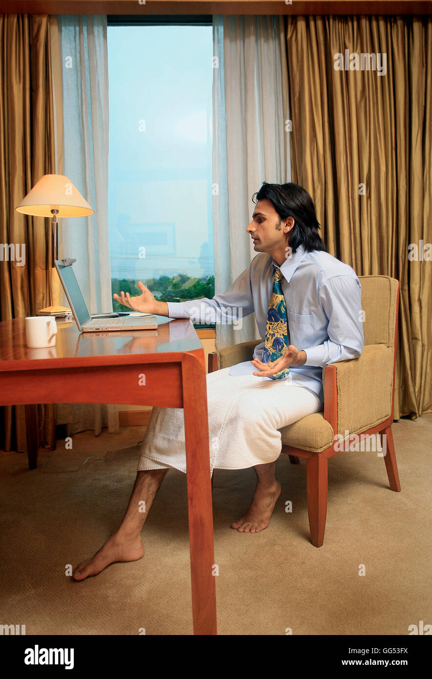 A man working on laptop Stock Photo - Alamy