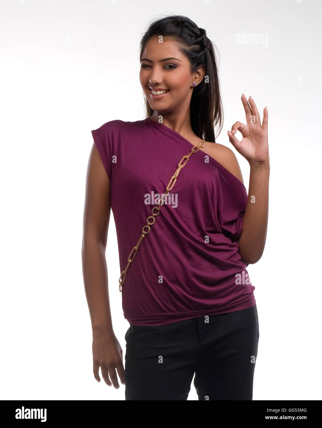 Woman making a hand gesture Stock Photo - Alamy