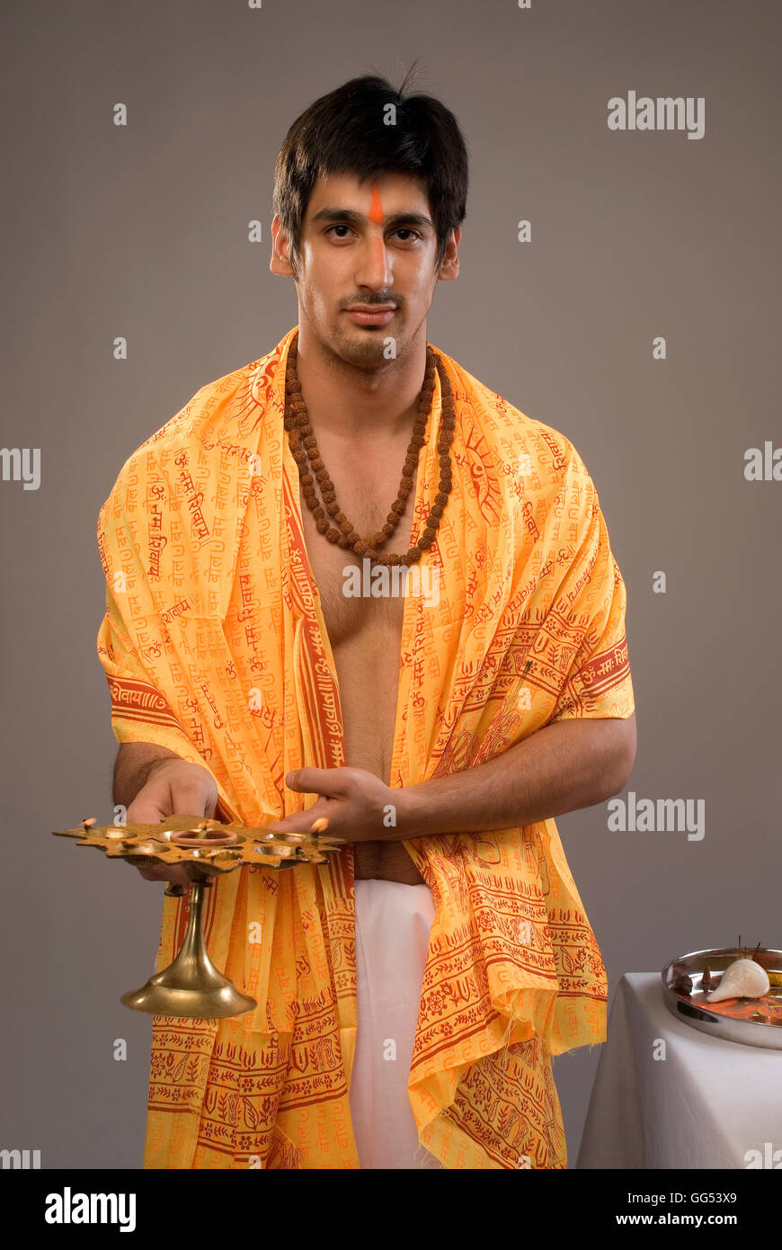 Man offering prayers Stock Photo - Alamy